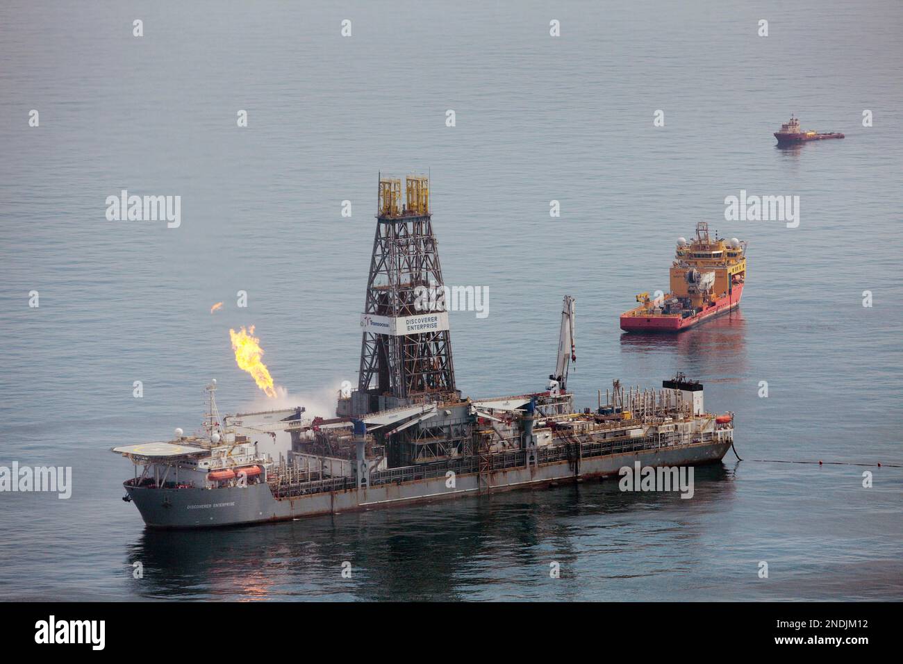 The Transocean Deepwater Discoverer drilling rig operates over the site ...