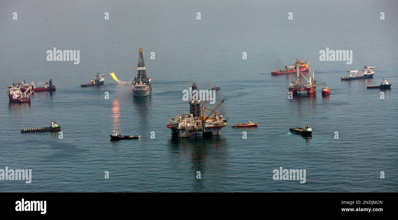 Vessels operate near the Transocean Deepwater Discoverer drilling rig ...