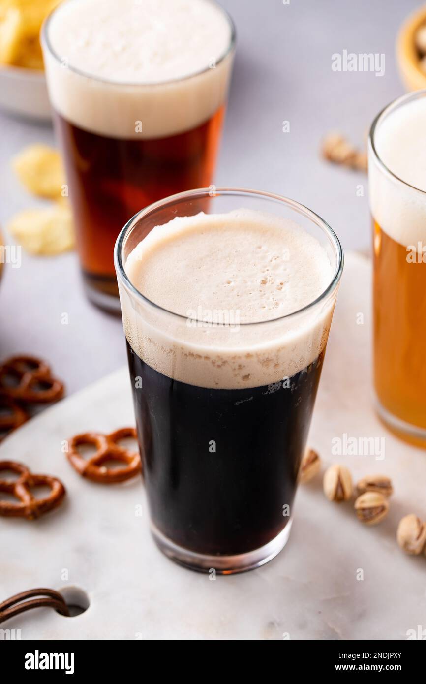Variety of beer with dark stout, traditional lager and belgian white ...