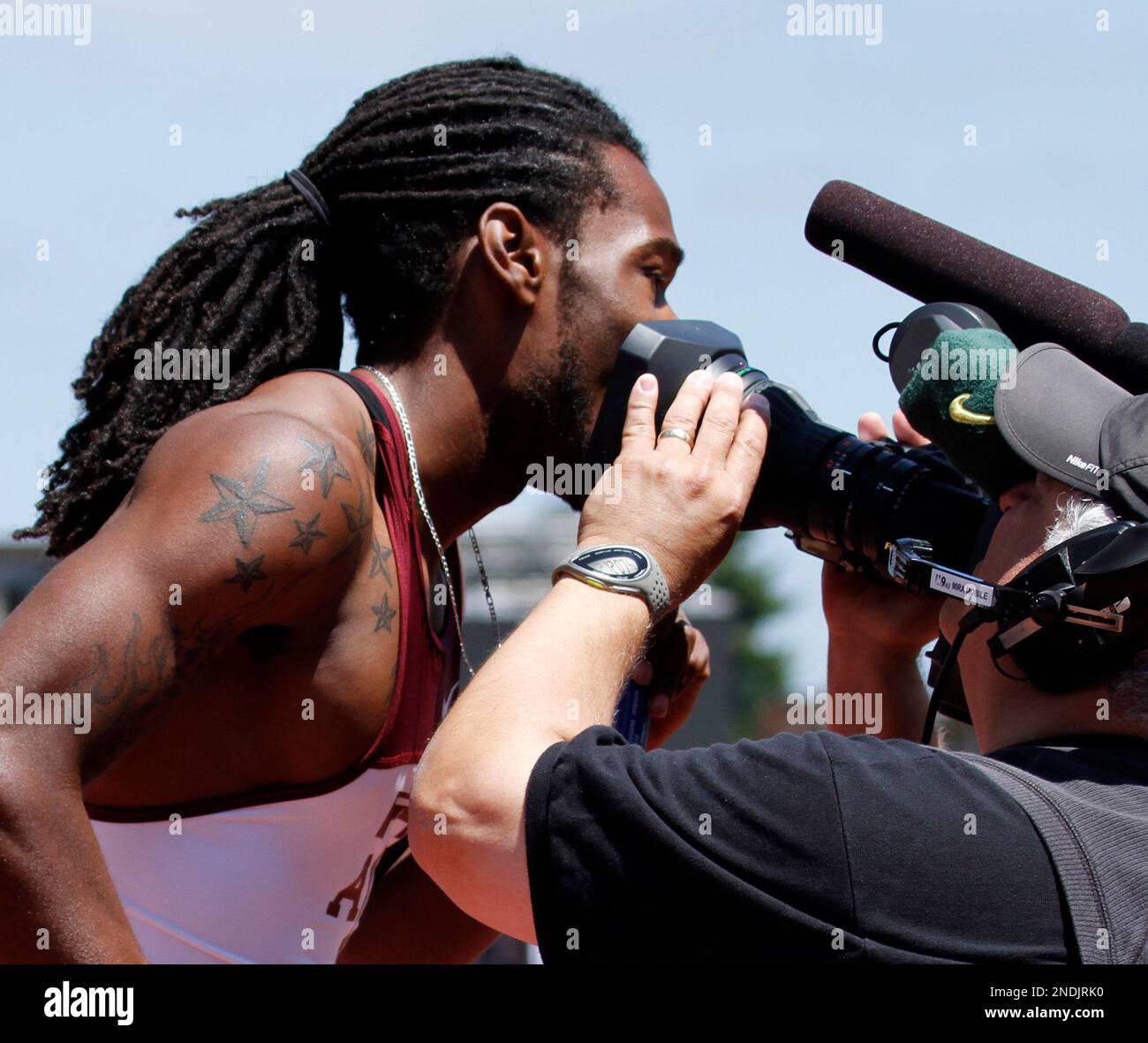 Texas A&M's Tabarie Henry, left, kisses the television camera lens in ...