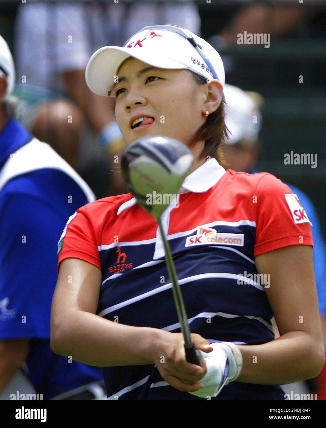 Na Yeon Choi of South Korea watches her drive down the first fairway ...