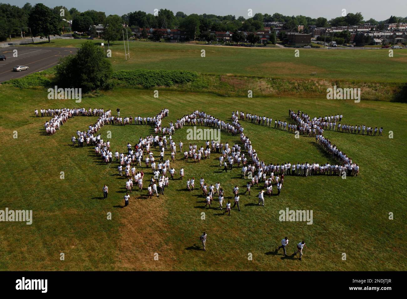 In this June 4, 2010 photo, students disband from a formation reading ...