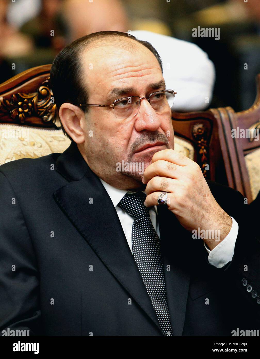 Iraq's Prime Minister Nouri al-Maliki attends a ceremony marking the ...