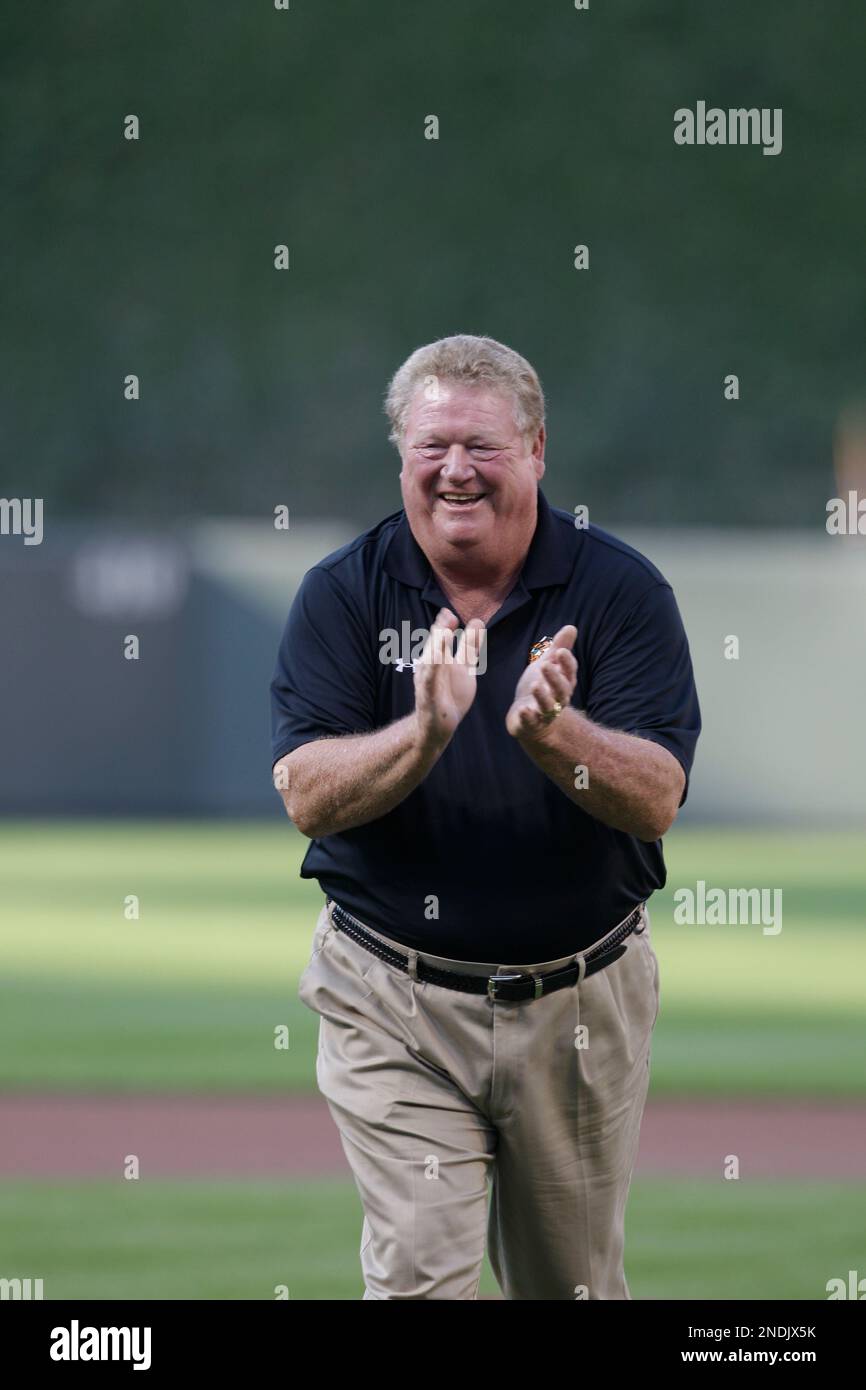 Former Baltimore Orioles player Boog Powell smiles after throwing out ...