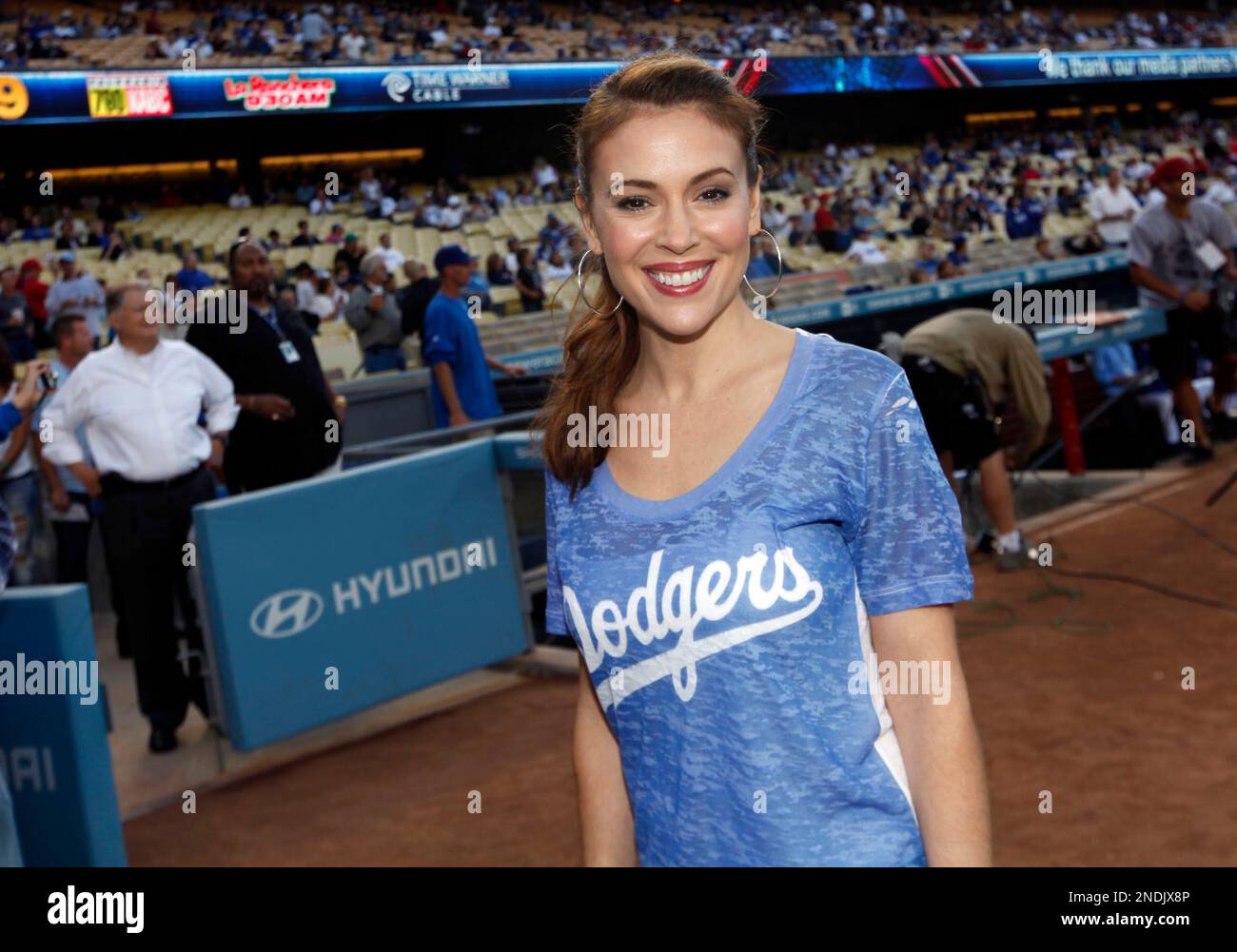 Actress Alyssa Milano poses on the field during Grapes From California ...
