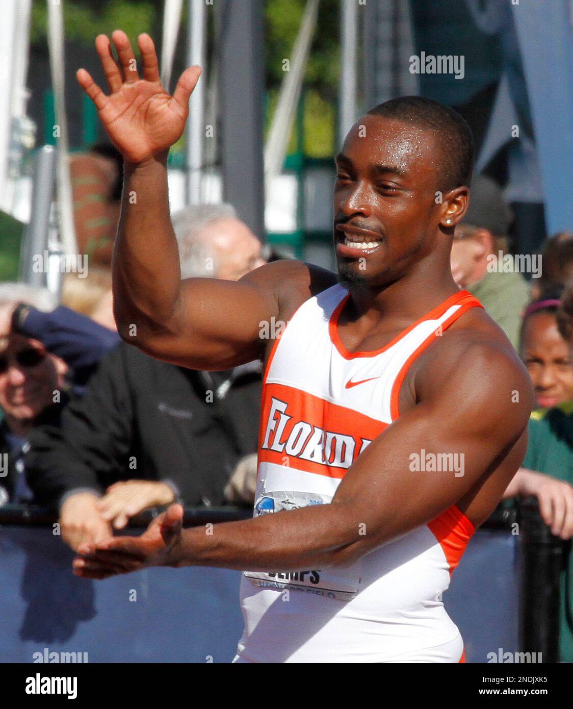 Florida's Jeff Demp celebrates after winning the 100 meters with a time ...