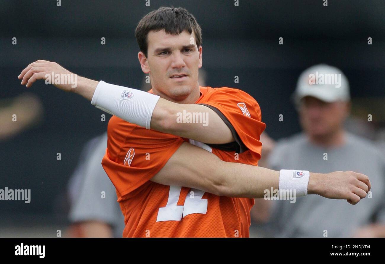 Cleveland Browns quarterback Jake Delhomme stretches his arms during ...