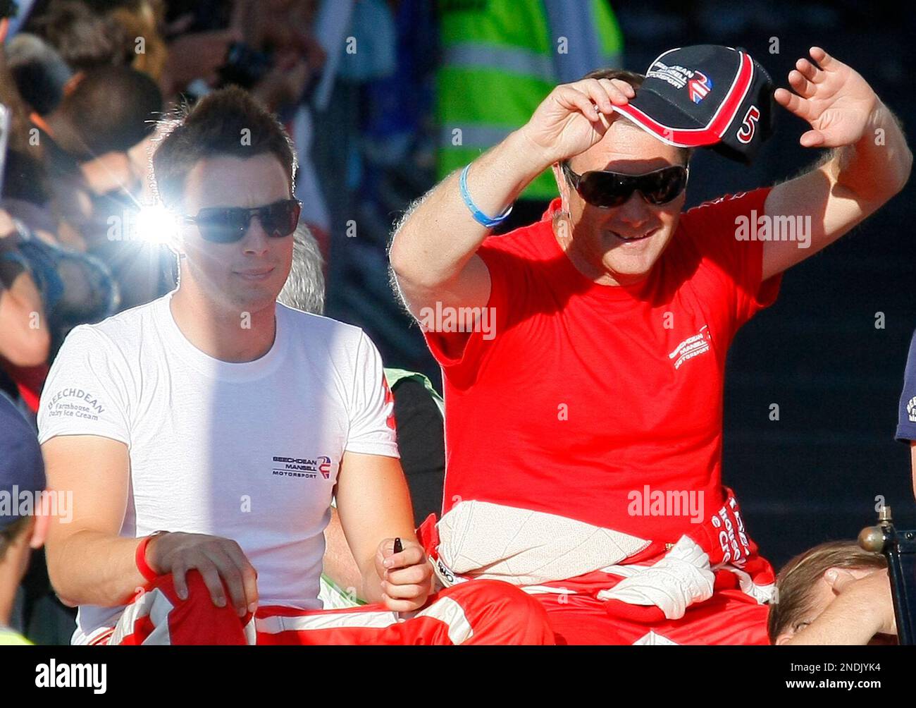 Former world champion of Formula 1 Nigel Mansell, right with his son ...