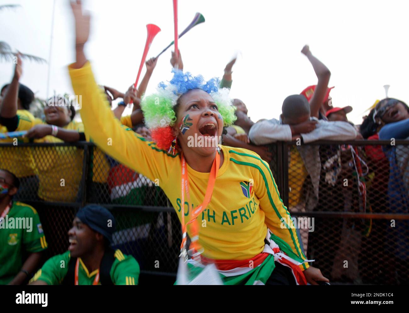 South African fans, celebrate while watching the opening ceremony prior ...