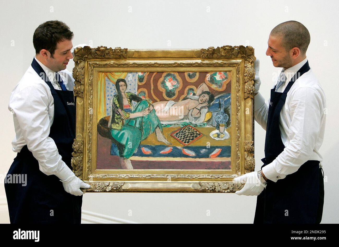 Employees display Henri Matisse's Odalisques Jouant Aux Dames, which is ...