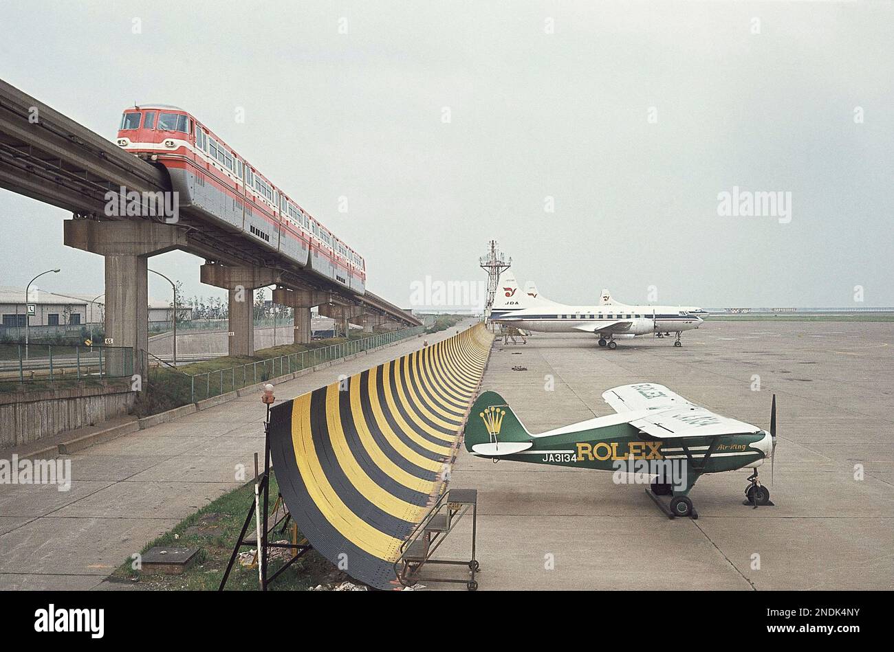The monorail, with the Tokyo air traffic control tower and Tokyo ...