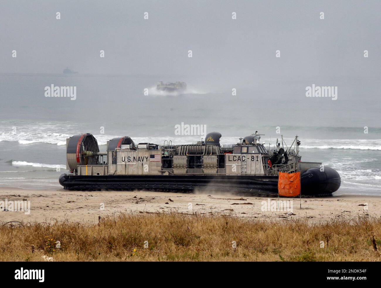 A LACA (land craft air cushion) gets turned sideways while landing on ...