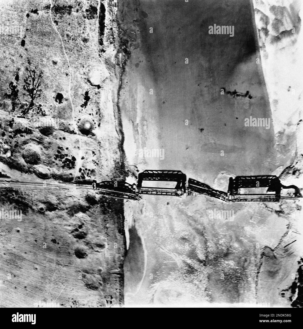 A bridge over the Mu River at Nyaungbinwun in Burma on March 10, 1944 ...