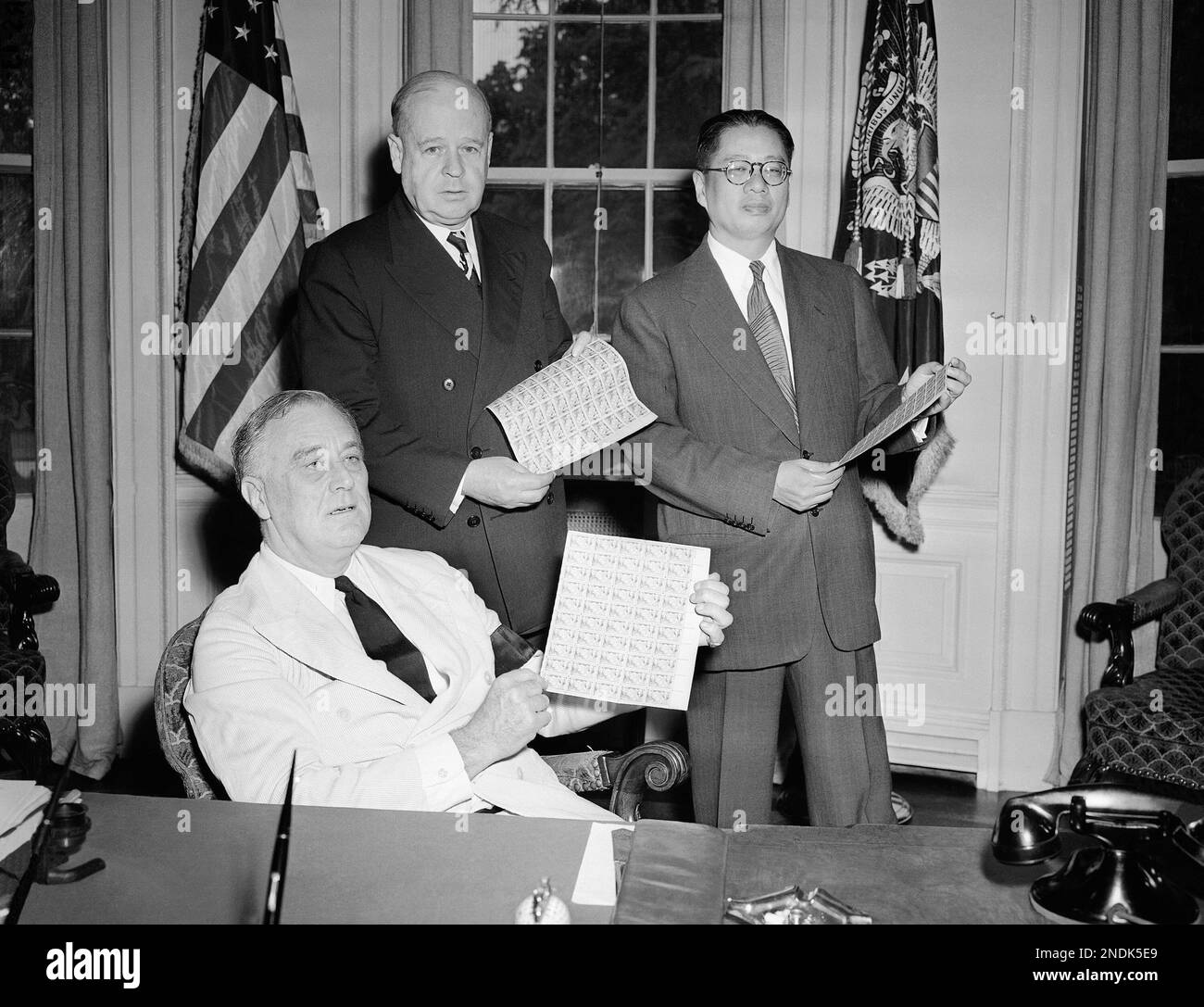 President Franklin D. Roosevelt, seated, and T.V. Soong, right, China's ...