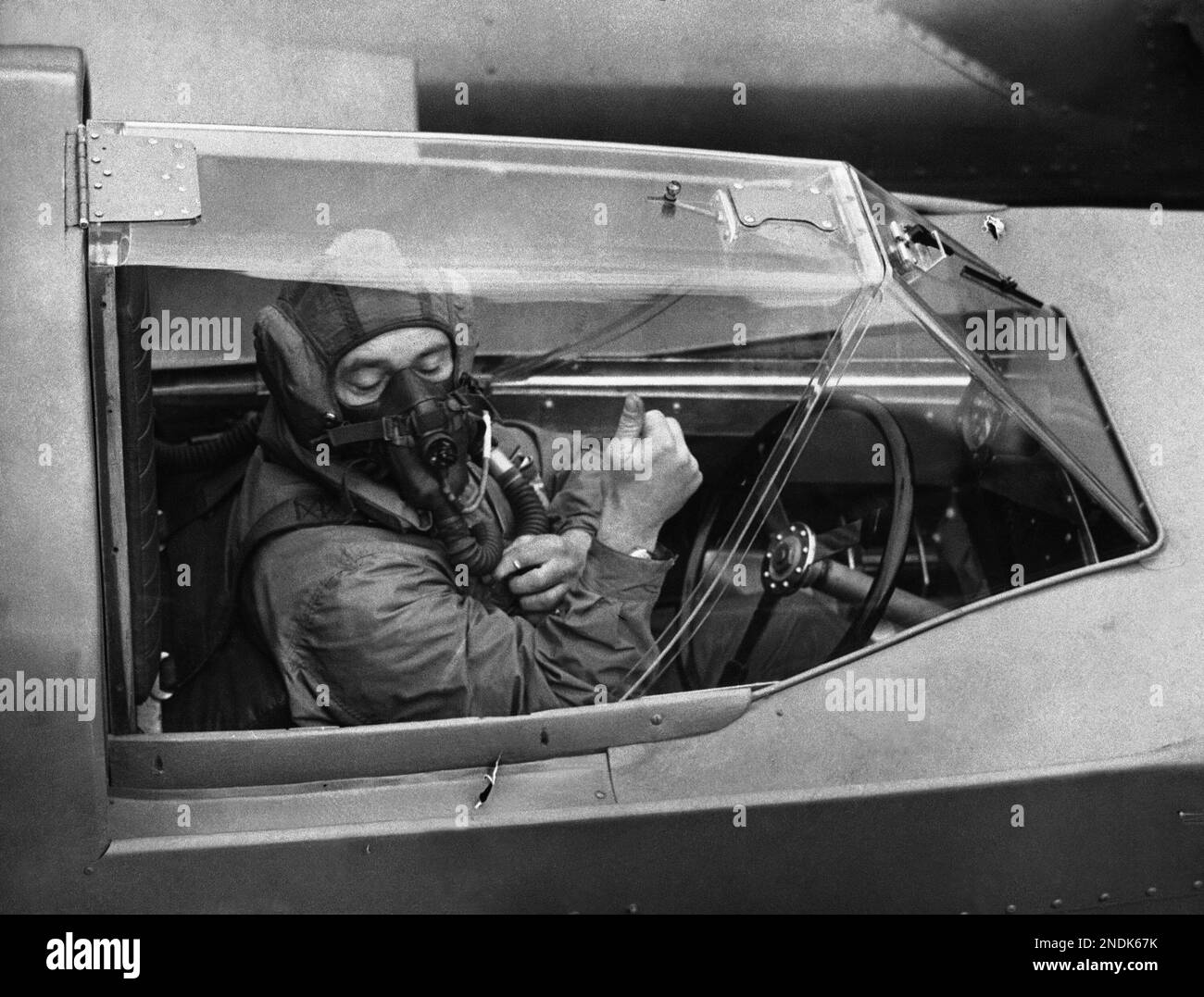 Donald Campbell in the cockpit of his turbo jet hydroplane Bluebird ...