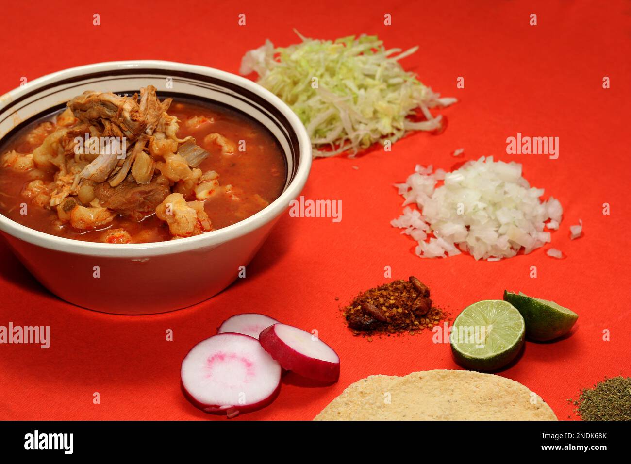 Typical Mexican food, plate of pozole with corn, meat, vegetables and ...