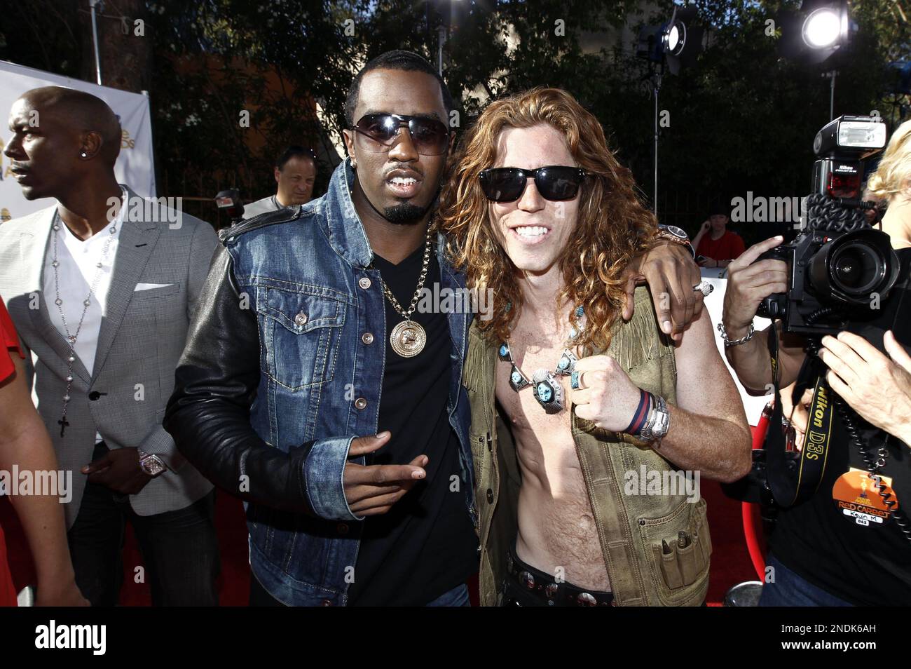 Sean Combs, left, and Shaun White arrive at the MTV Movie Awards in ...