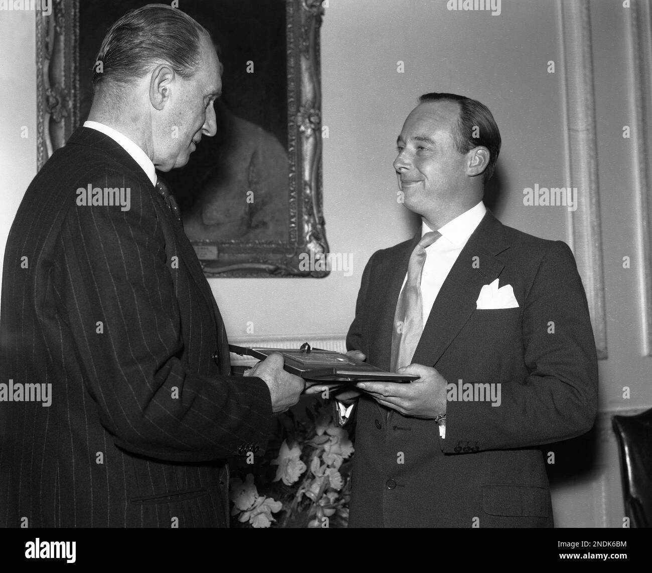 Donald Campbell, right, receives a replica of the Segrave Trophy for ...