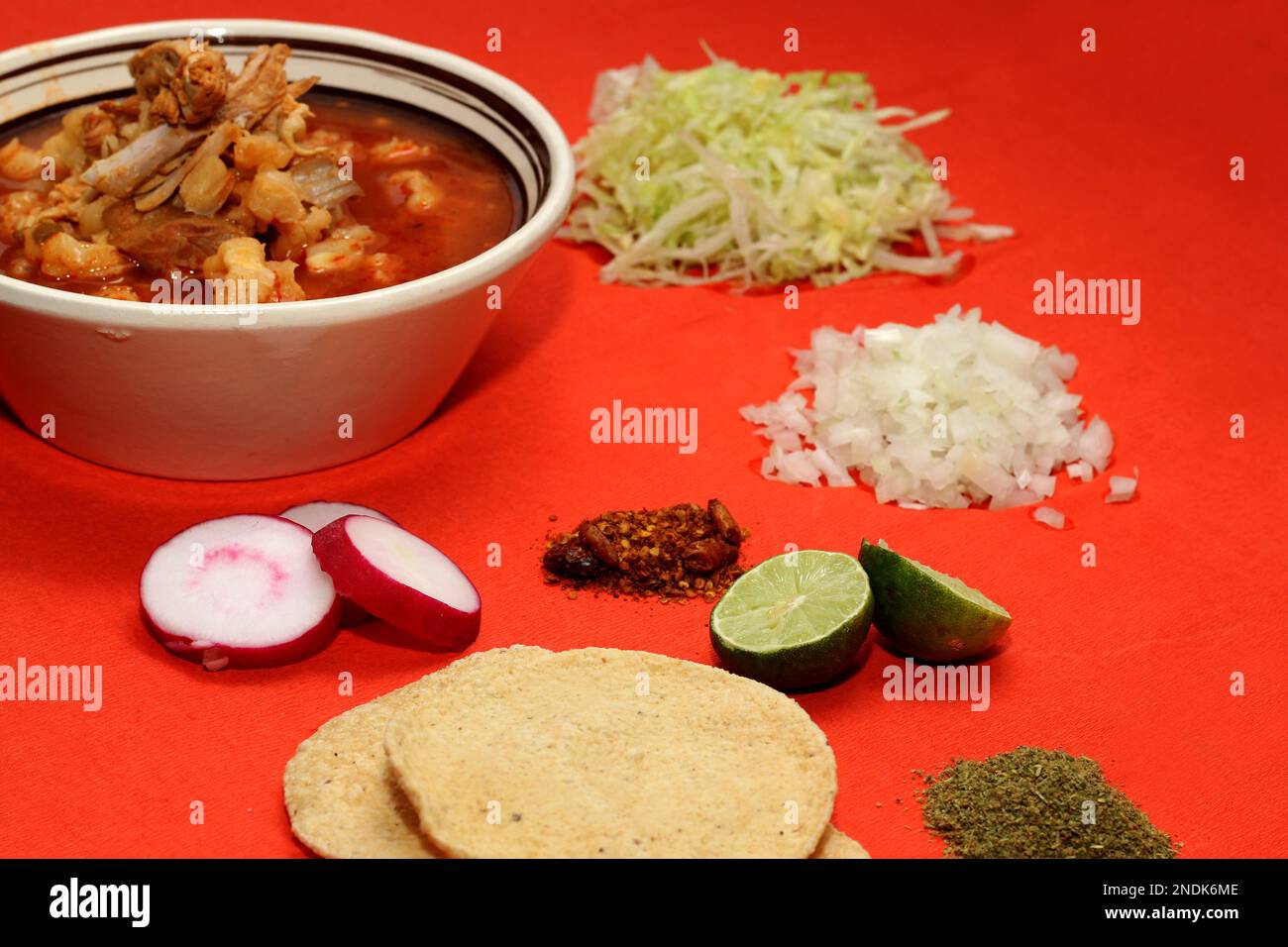 Typical Mexican food, plate of pozole with corn, meat, vegetables and ...