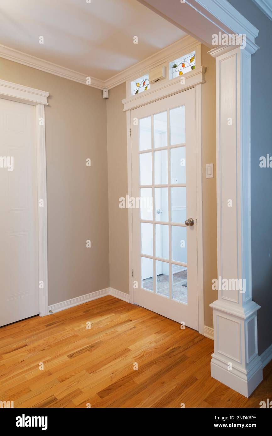 Hallway with oak wood floorboards and entryway inside country style ...