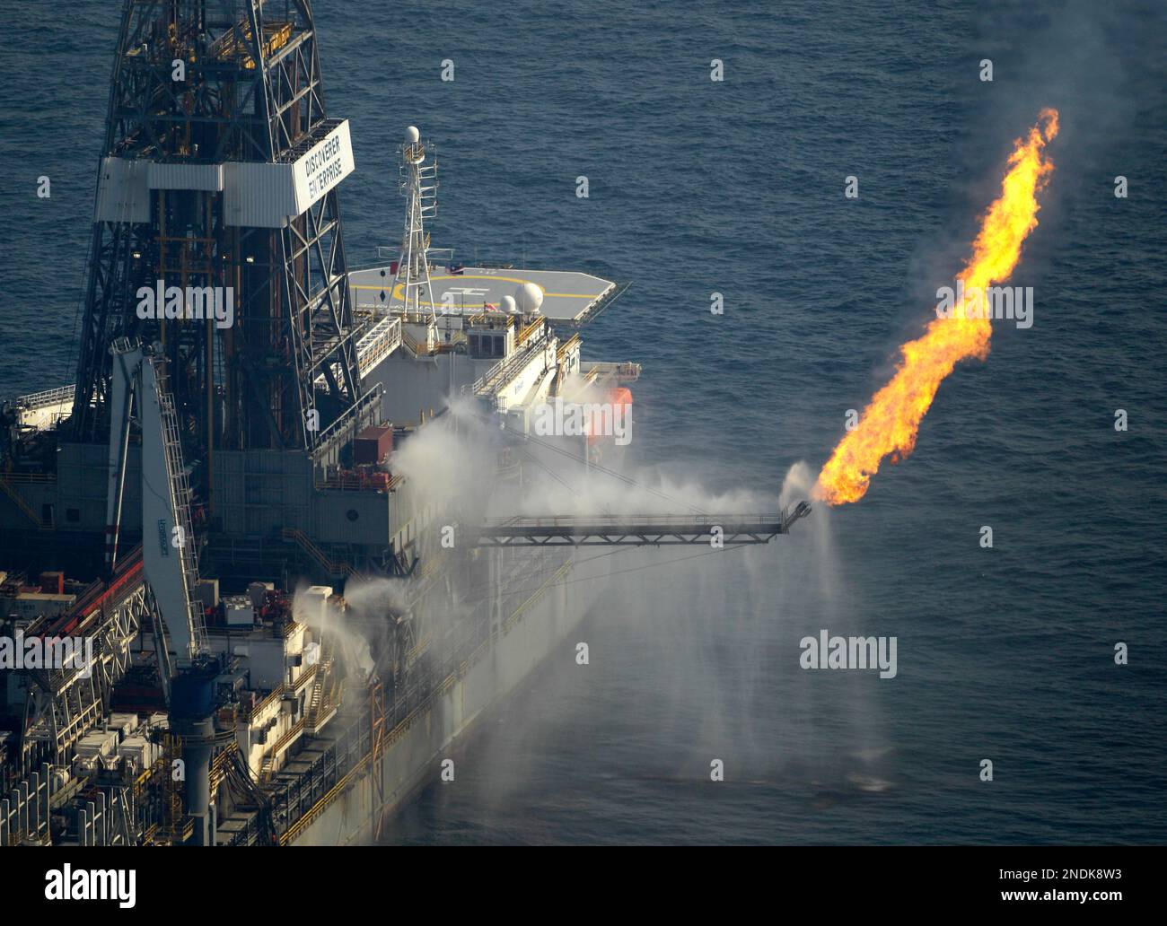 Gas is flared off on the Discovery Enterprise drilling ship which is ...