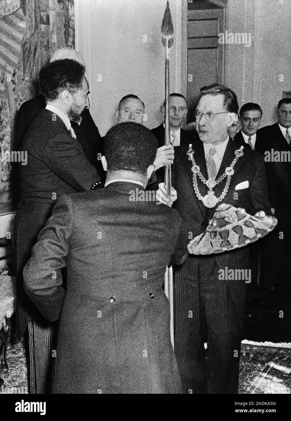 Haile Selassie, Emperor of Ethiopia, hands spear and shield from his ...