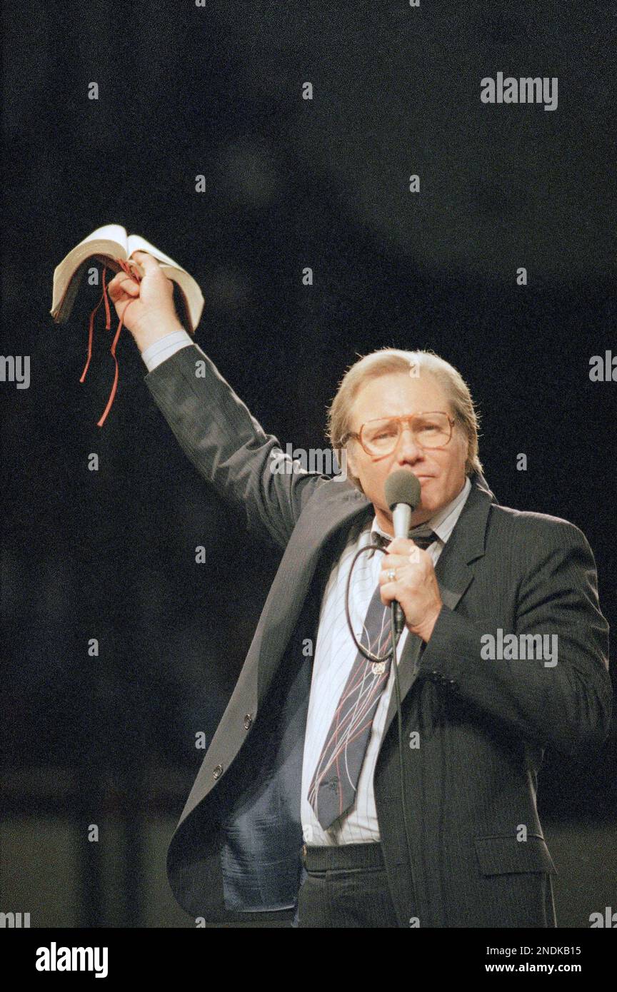 The Rev. Jimmy Swaggart gestures with the bible as spread the word of ...
