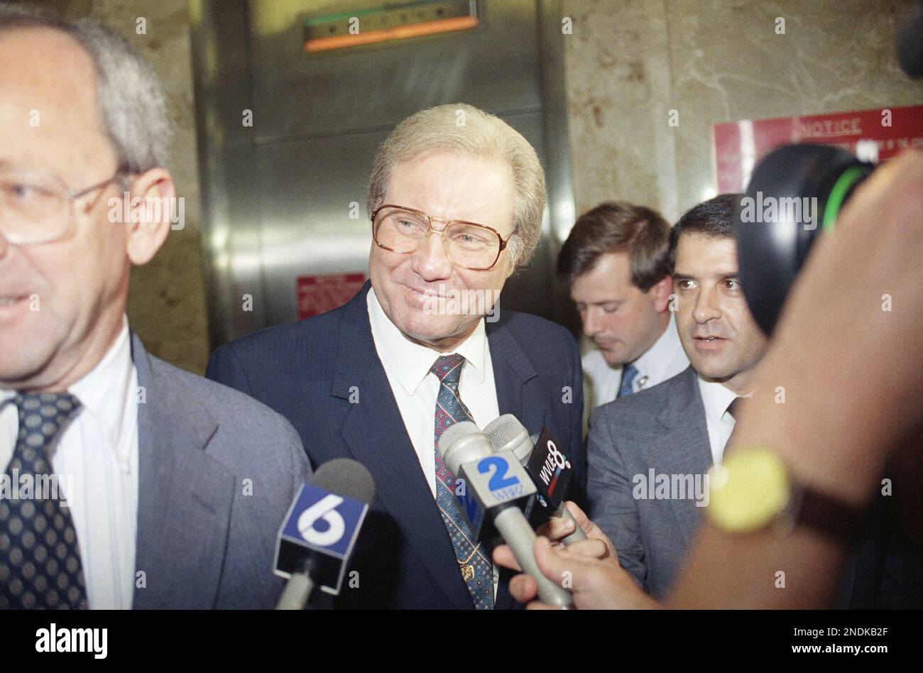 Evangelist Jimmy Swaggart talks with reporters as he leaves Civil ...
