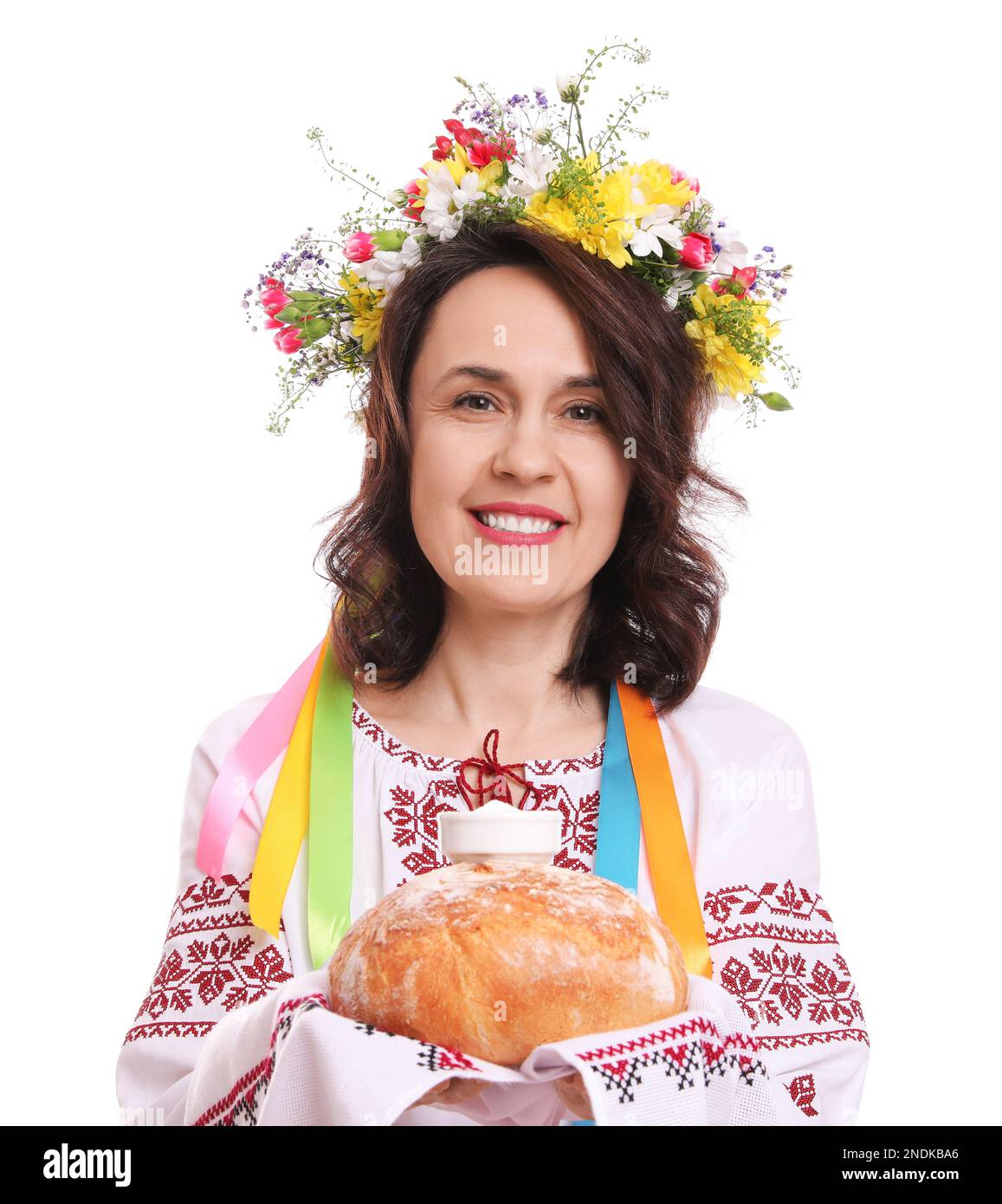 Happy woman in national ukrainian clothes with traditional korovai on ...