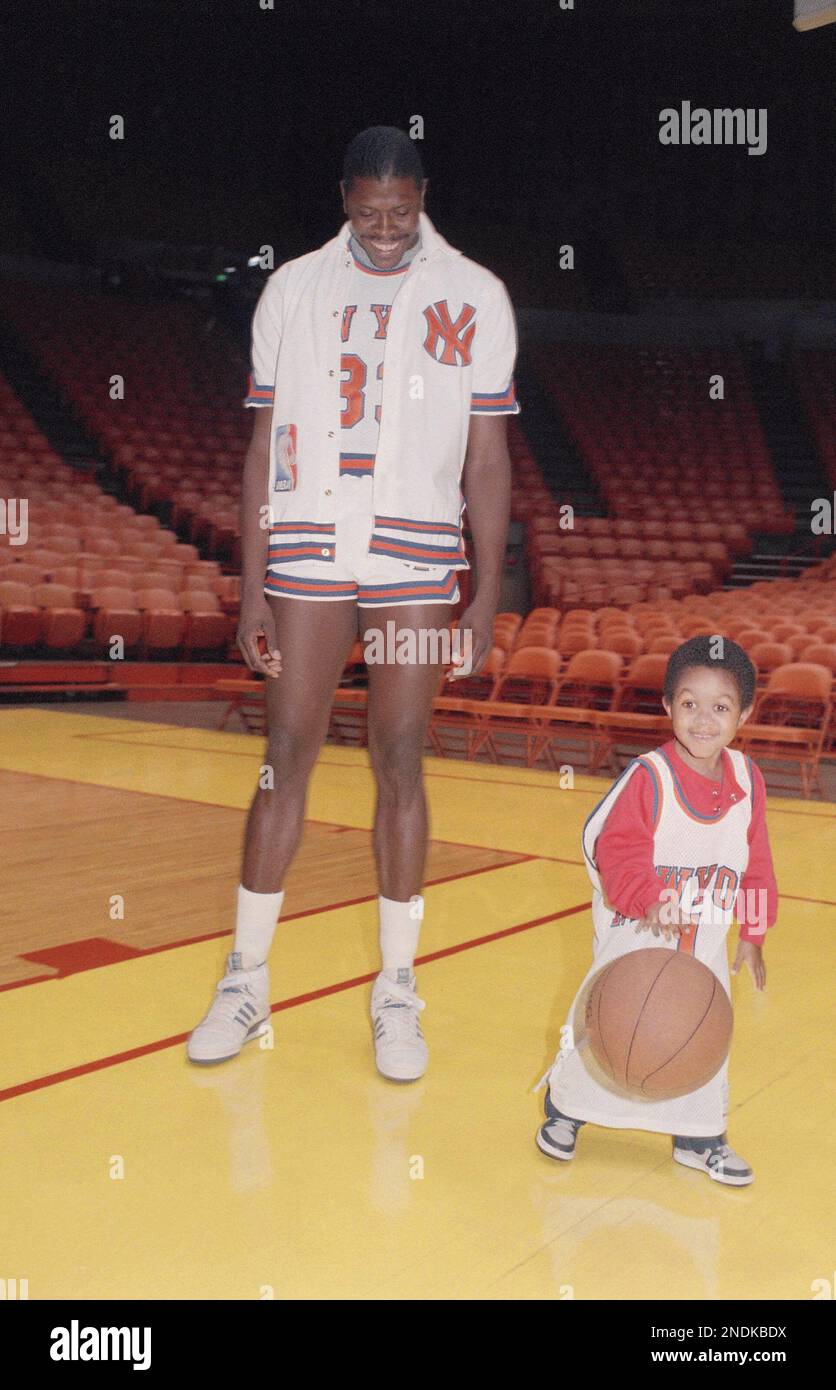 Patrick Ewing of the New York Knicks poses with actor Emmanuel Lewis ...