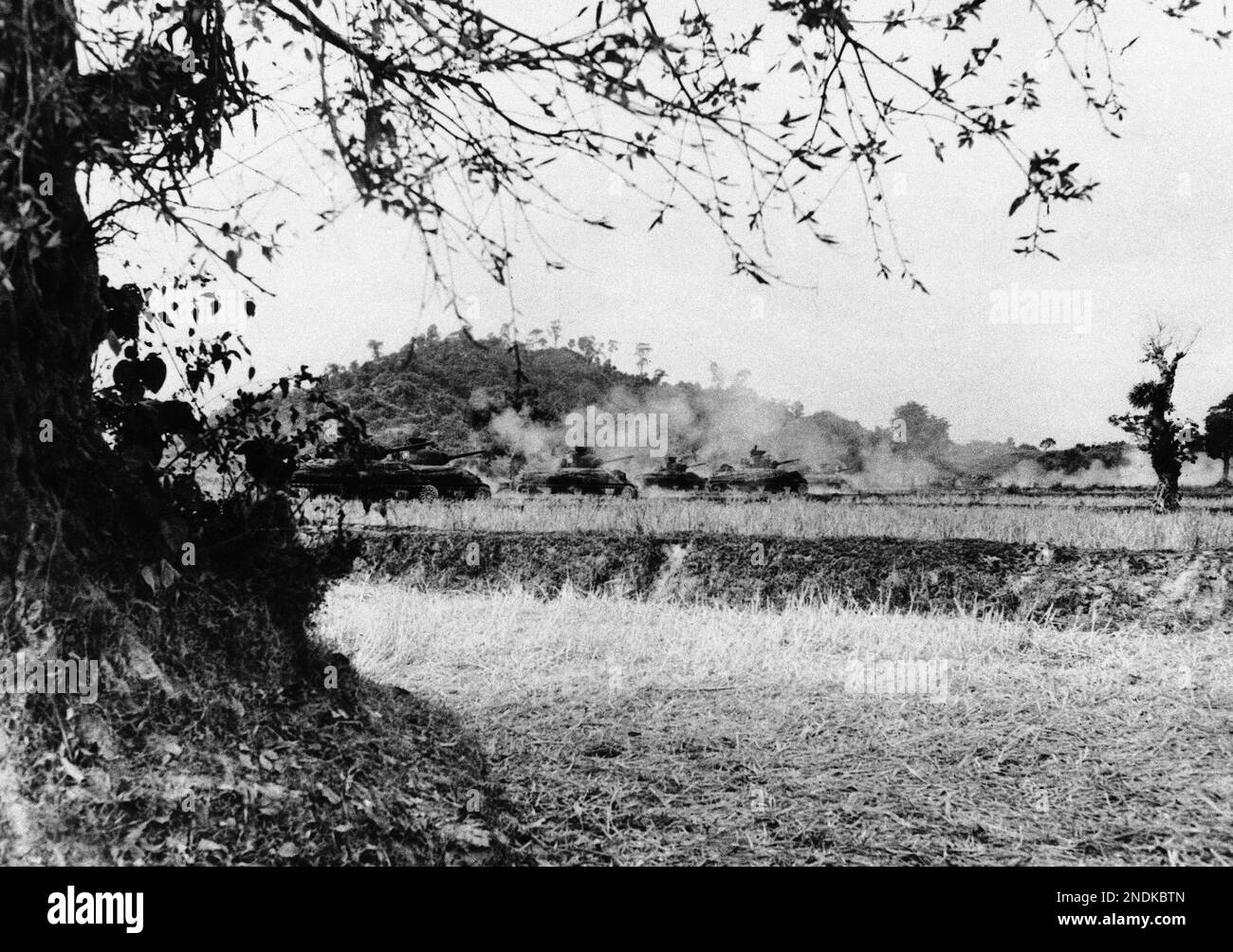 Tanks of B Squadron King George V’s Own 19th Lancers firing on Japanese ...