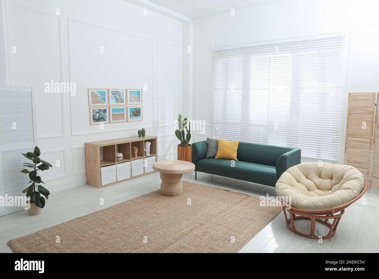 Comfortable sofa in modern living room. Interior design Stock Photo - Alamy