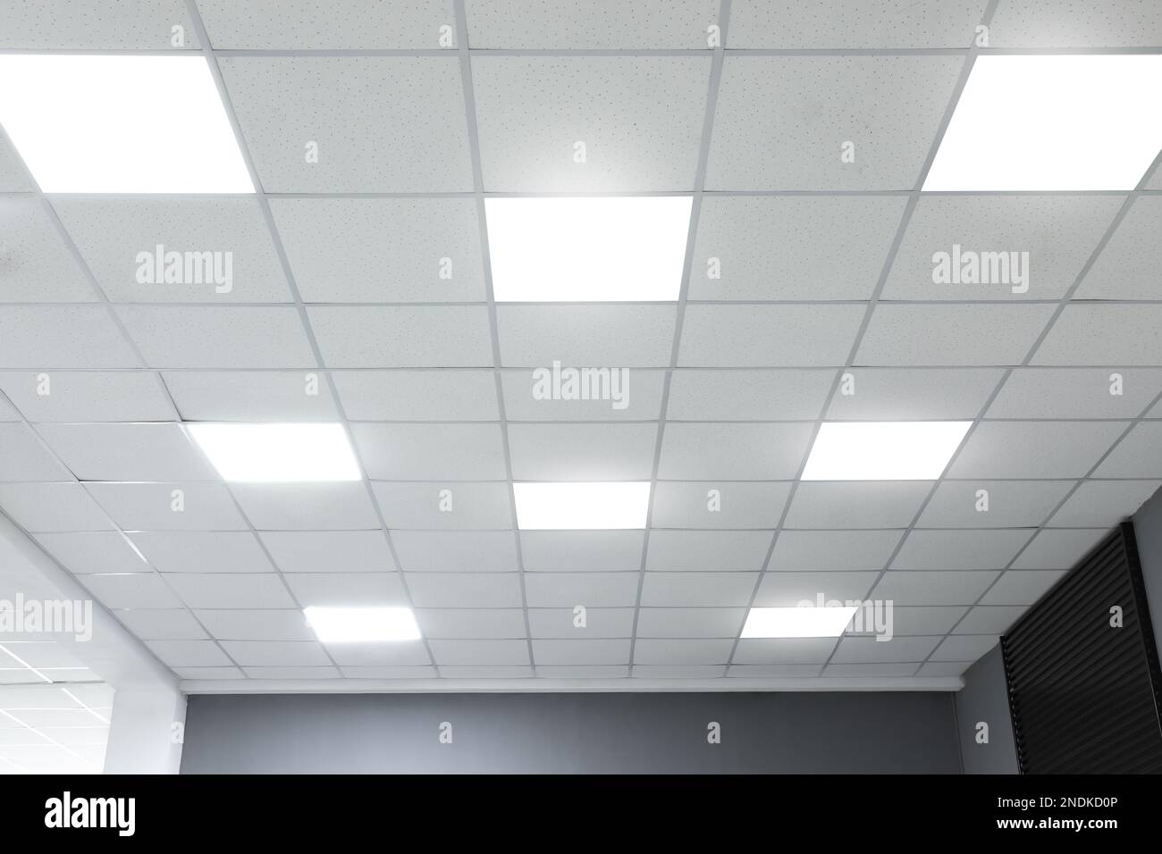White ceiling with lighting in office room Stock Photo - Alamy