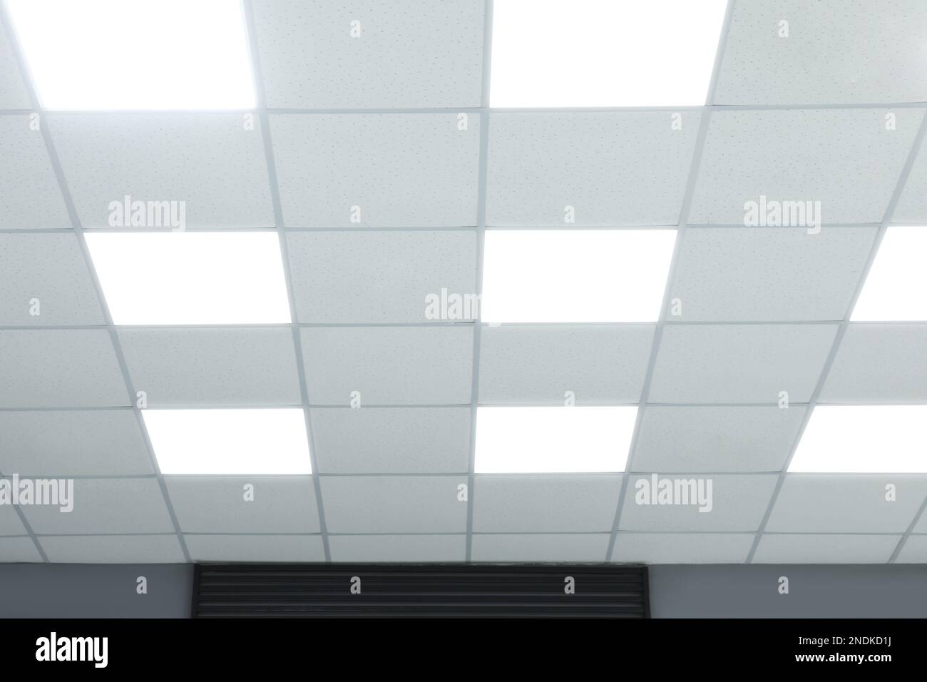White ceiling with lighting in office room Stock Photo - Alamy