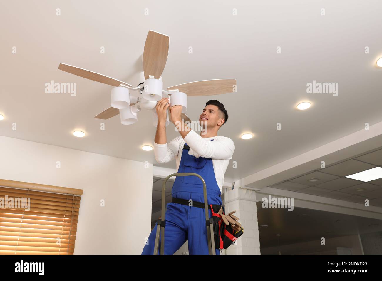 Changing lightbulb ladder hi-res stock photography and images - Alamy