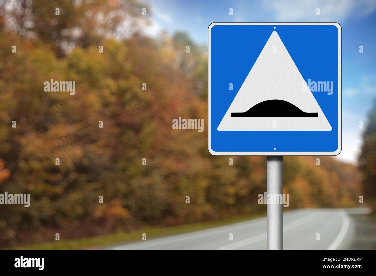 Sign Speed Bump near asphalt road outdoors Stock Photo - Alamy