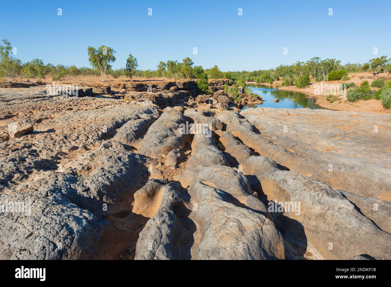 View of the eroded riverbed of the Leichhardt River at Leichhardt Falls ...
