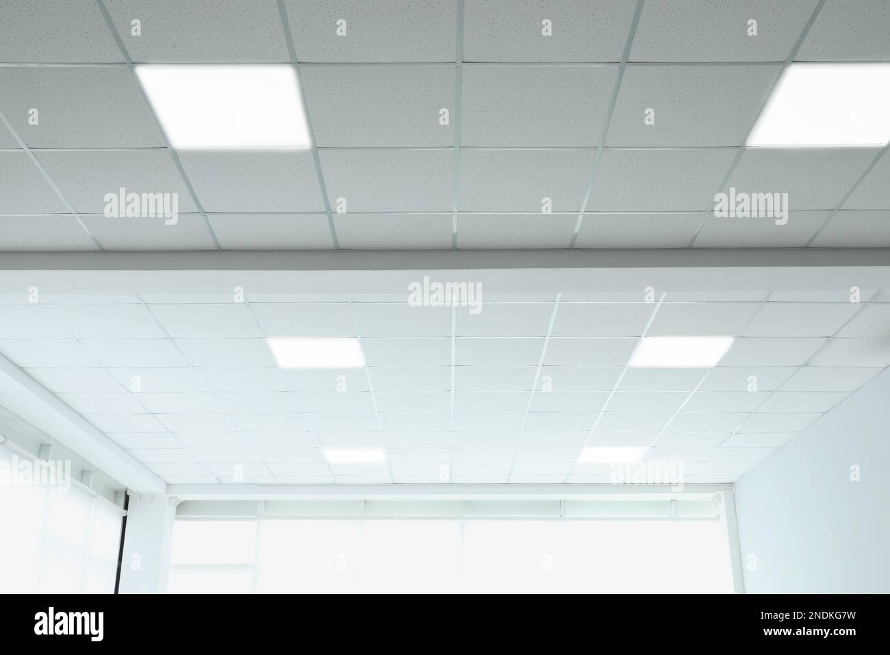 White ceiling in office room. Interior design Stock Photo - Alamy