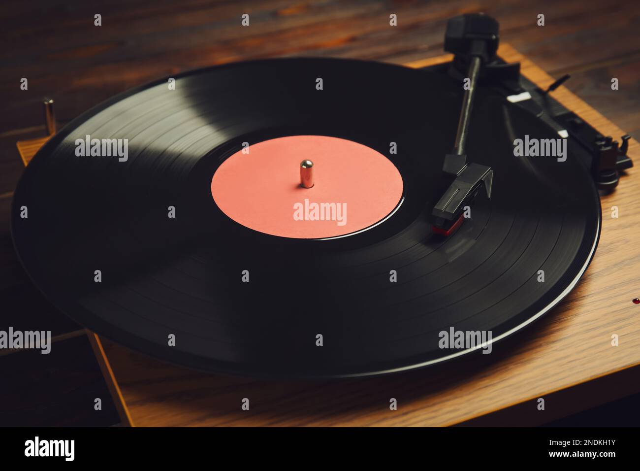 Modern vinyl record player with disc on table, closeup Stock Photo - Alamy
