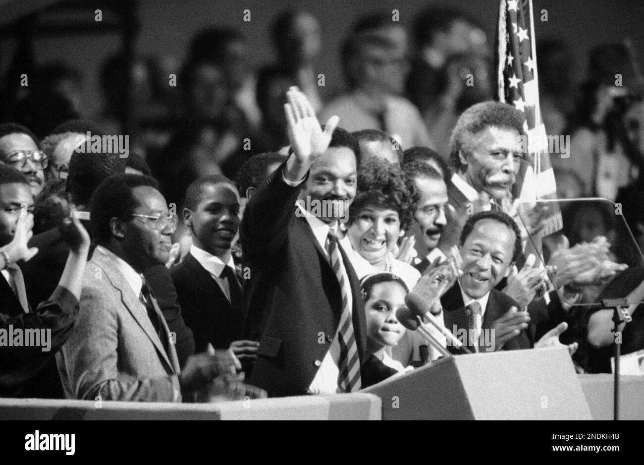 The Rev. Jesse Jackson waves at the beginning of his address to the ...
