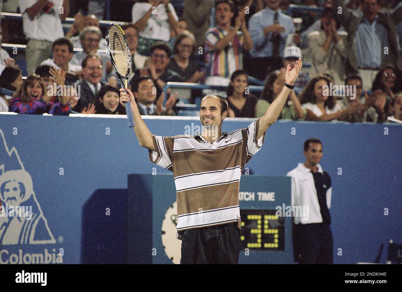 Top seed Andre Agassi of Las Vegas reacts to the crowd’s applause after ...