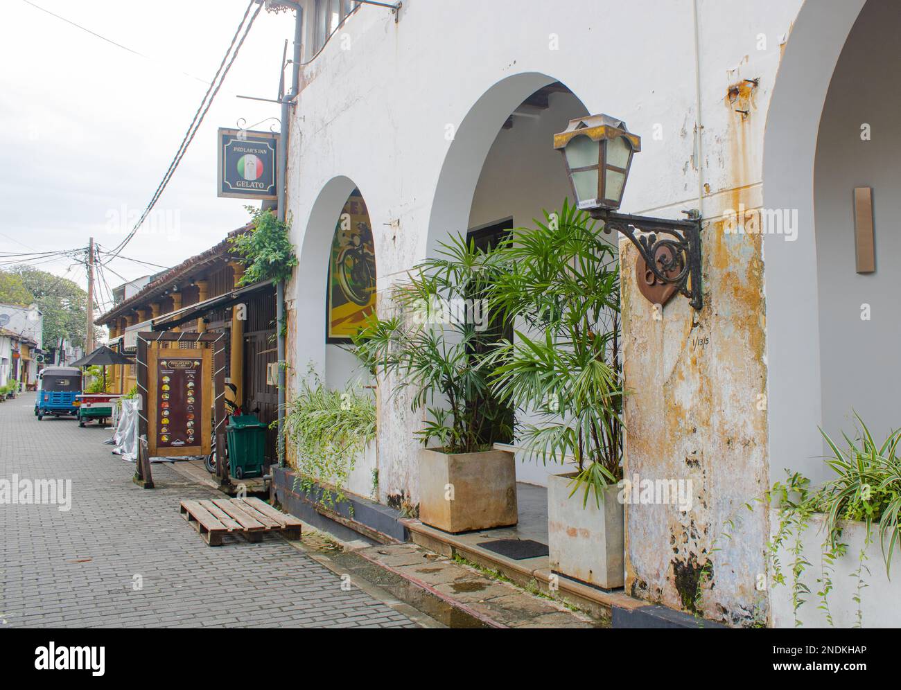 old lamp on the wall of the building, old dutch architecture in galle ...