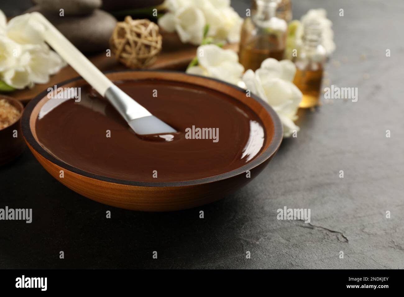 Composition with cosmetic product for spa body wraps on black ...