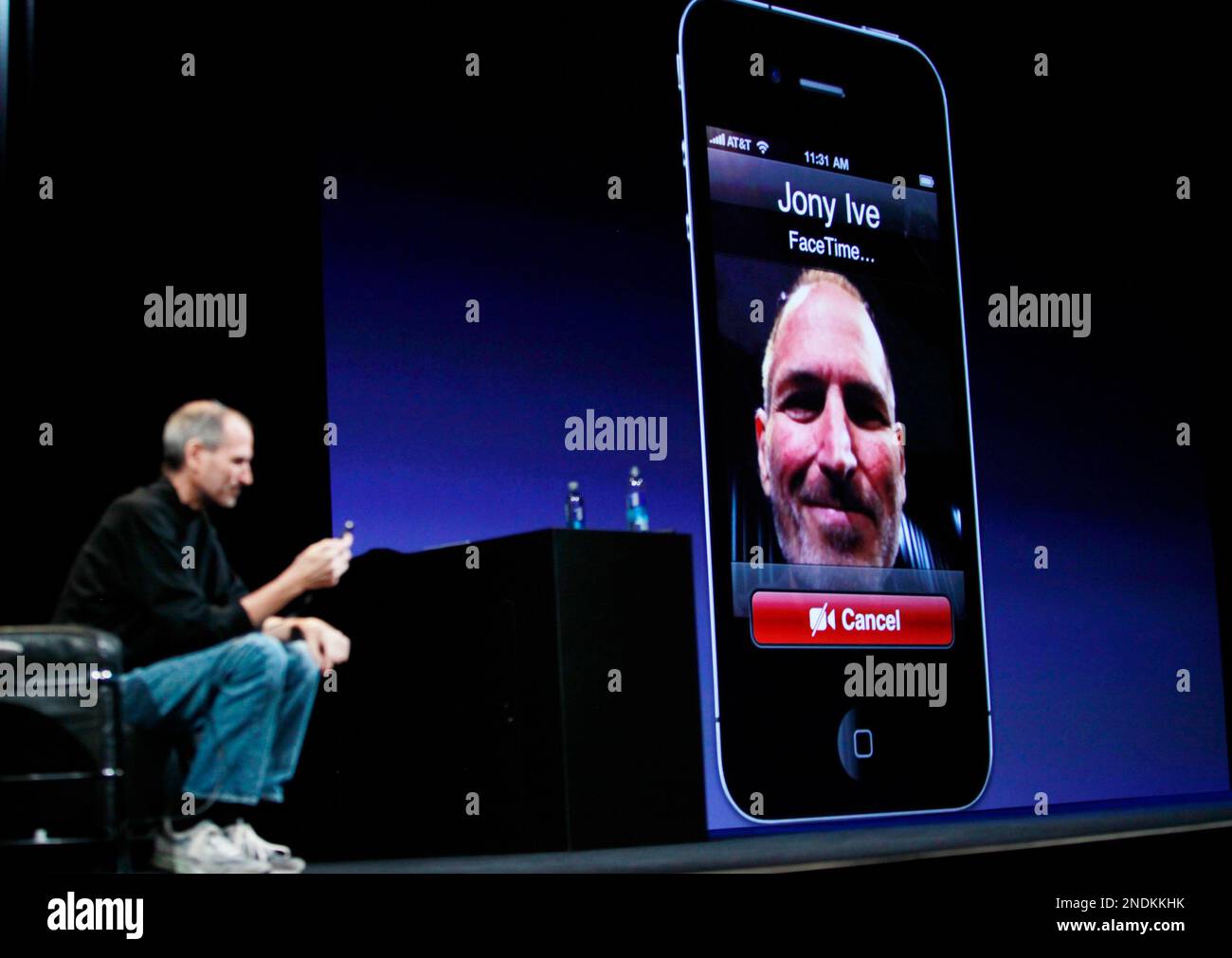 Apple CEO Steve Jobs demonstrates the new FaceTime on the new iPhone at ...