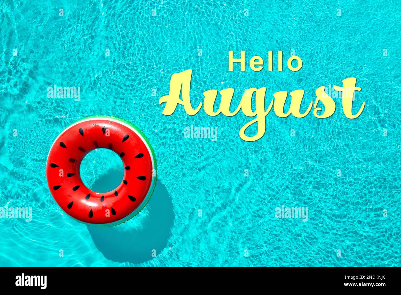 Hello August. Inflatable ring floating in swimming pool, top view Stock ...