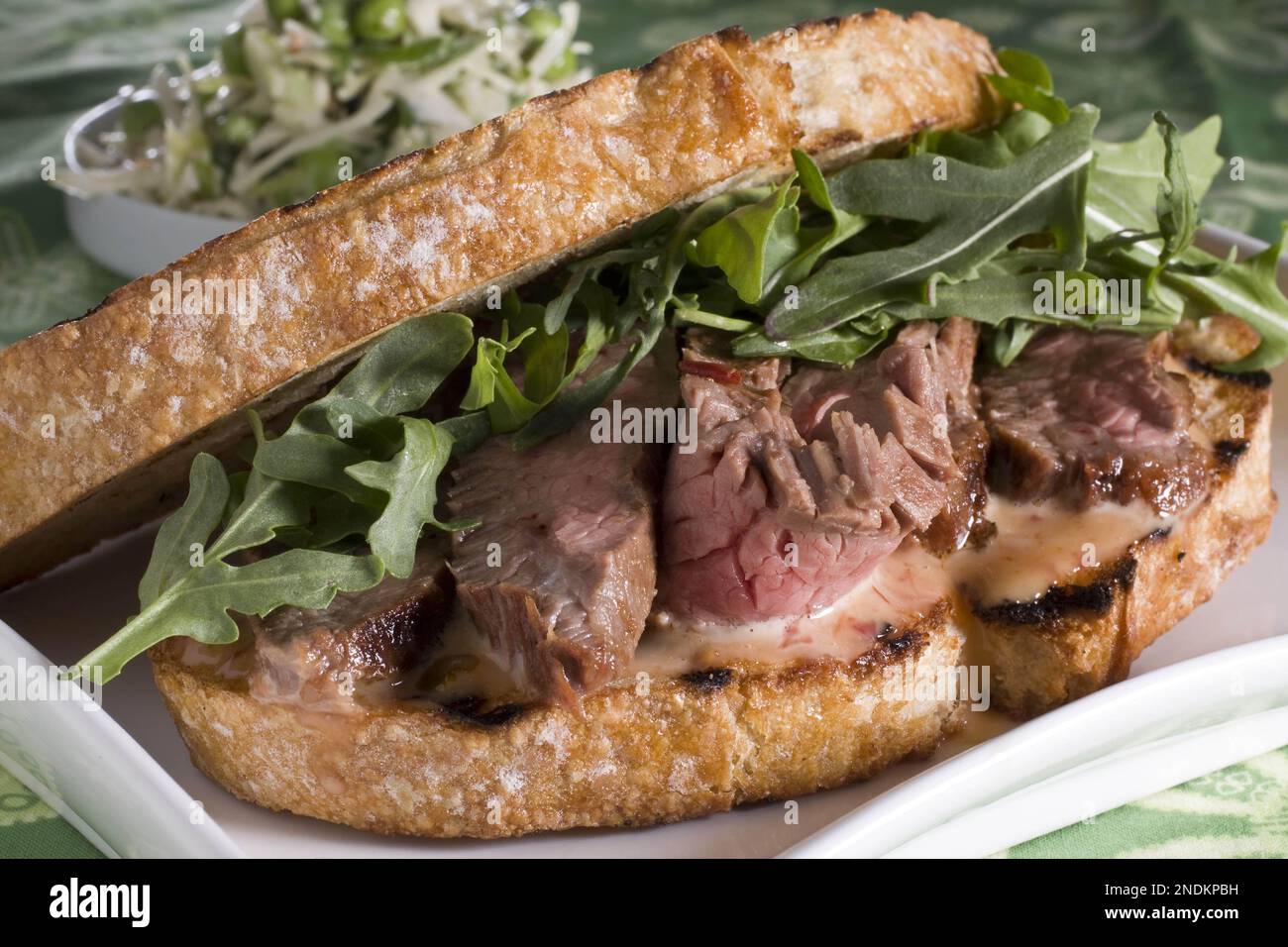 A ginger-soy marinated flank steak sandwich is seen in this May 23 ...