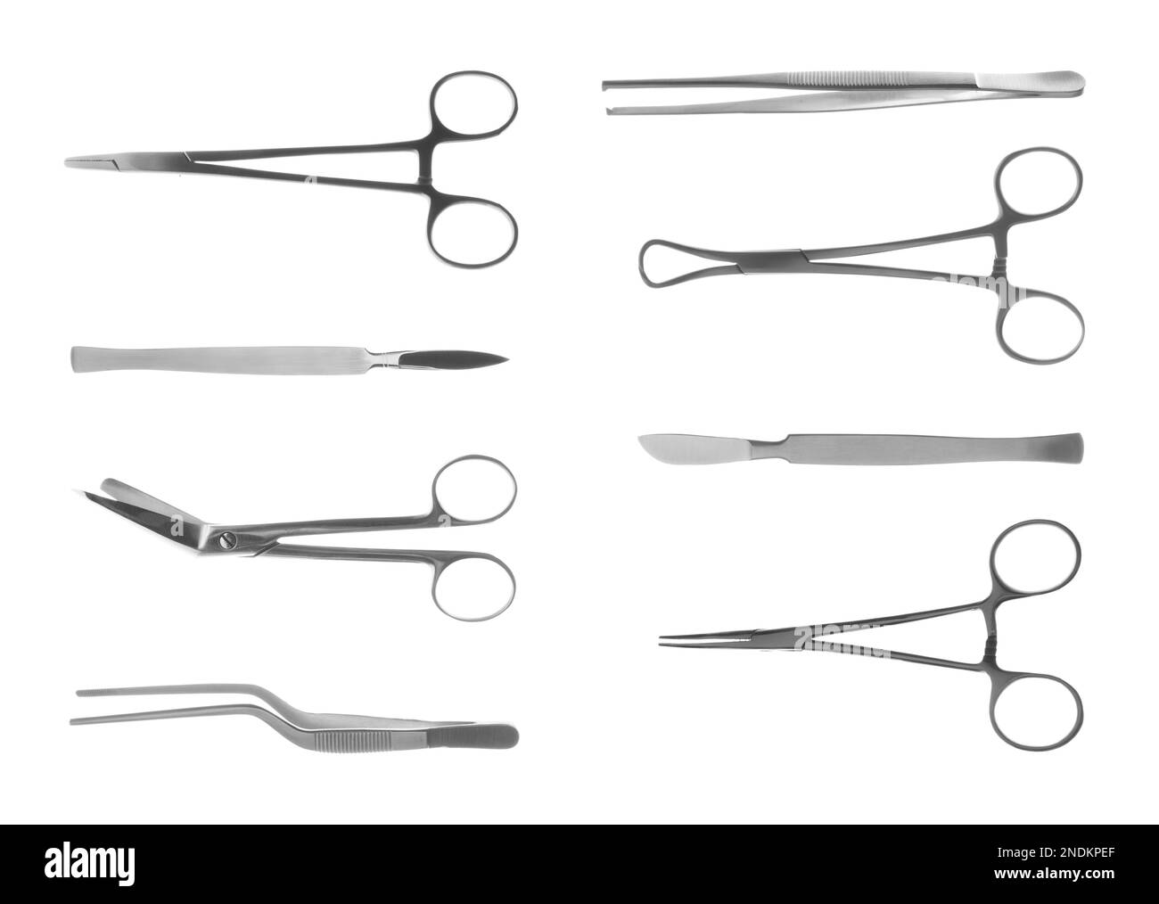 Set with different surgical instruments on white background Stock Photo ...