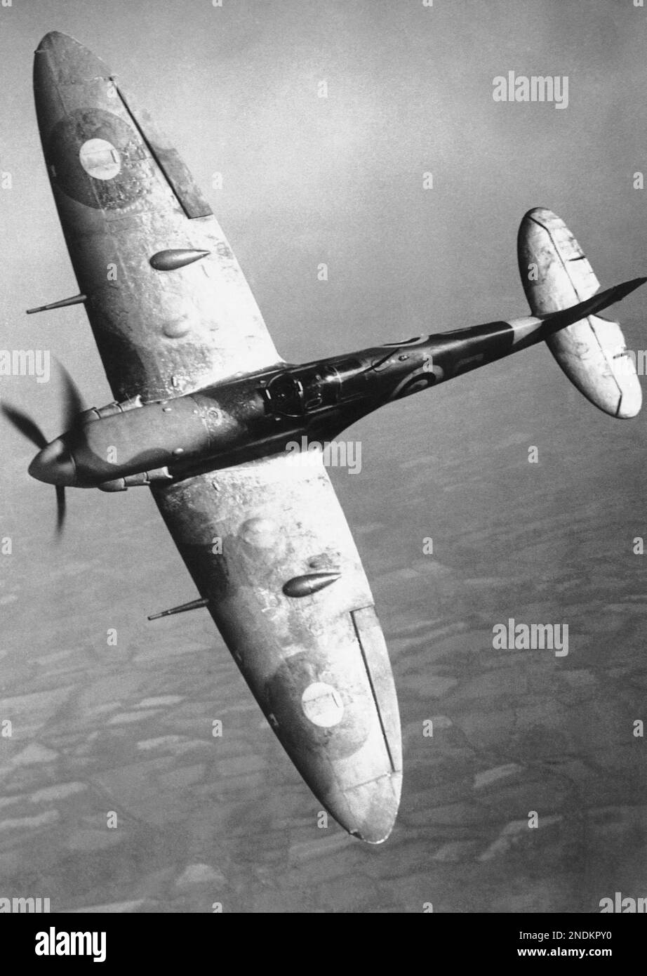 A cannon-armed Spitfire, one of the new type British pursuit planes ...