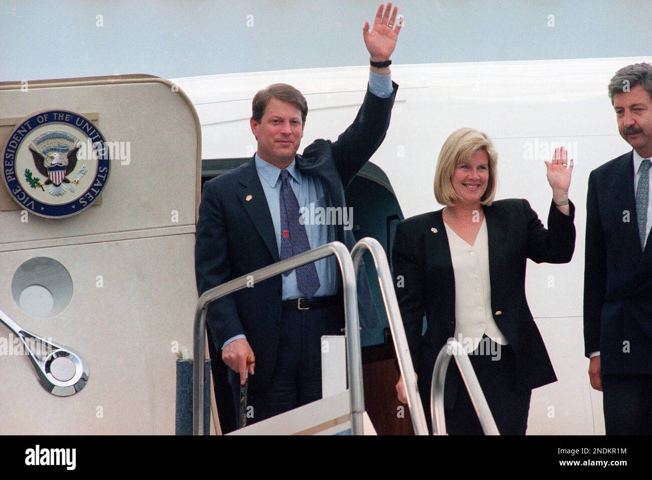 U.S. Vice-President Al Gore, left and his wife Tipper, wave to the ...