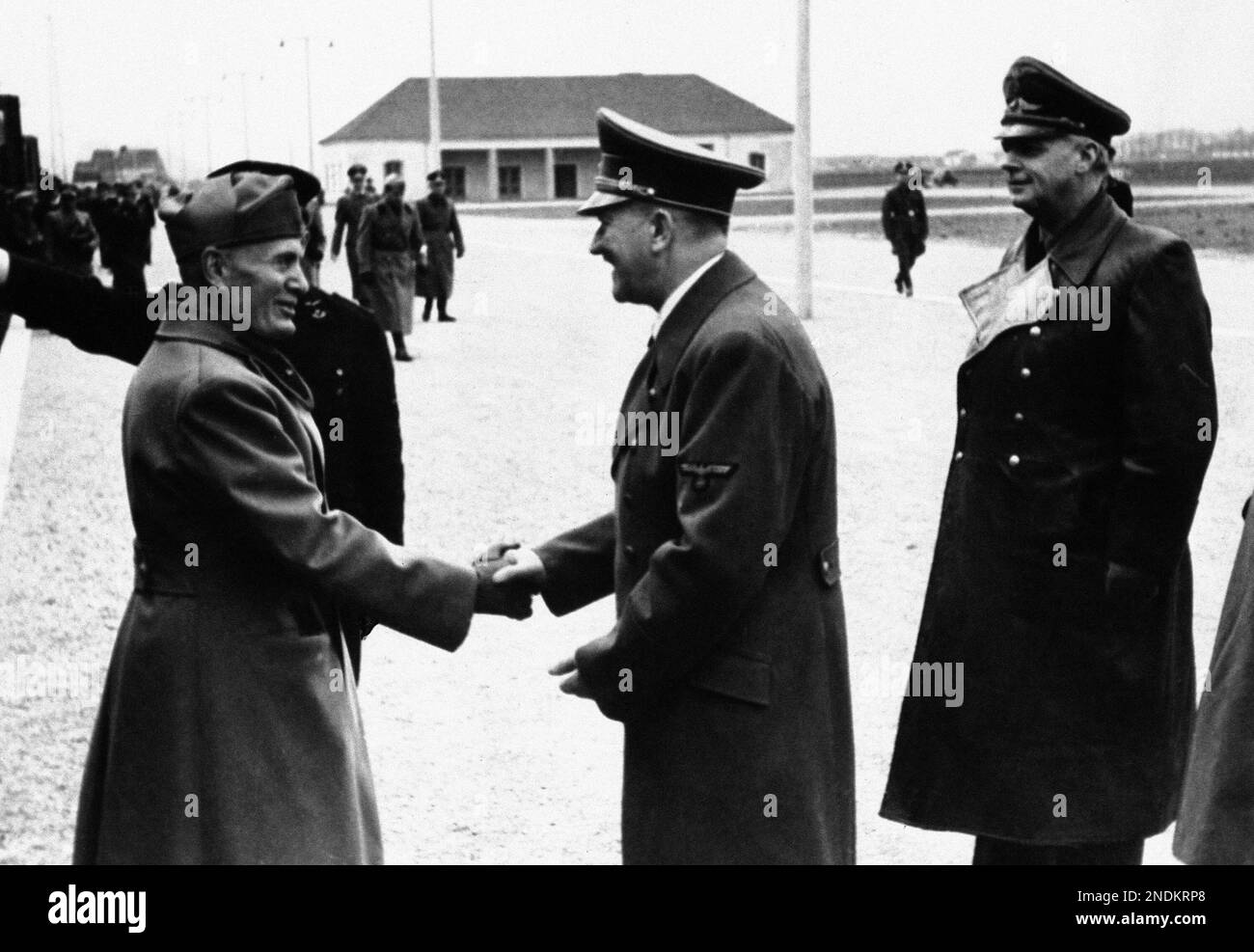 Italian dictator Benito Mussolini, left, being greeted by German ...